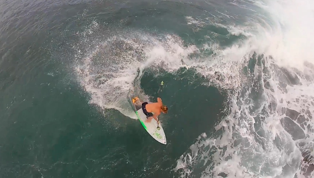 Rocky slab SUP surfing with Zane Schweitzer - SUPboarder Magazine