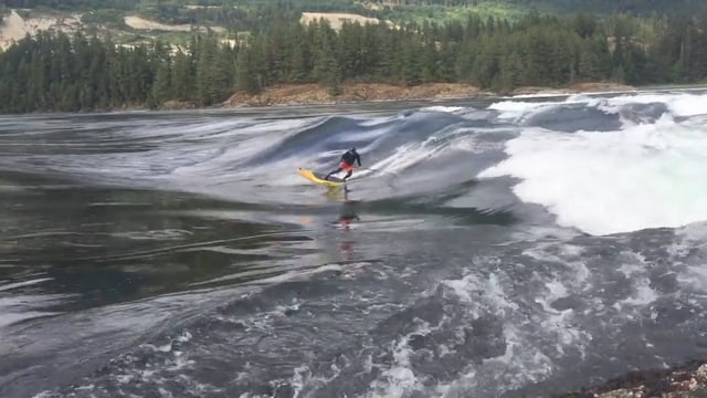 Spencer Lacy - Now that's SUPing a standing wave! - SUPboarder Magazine