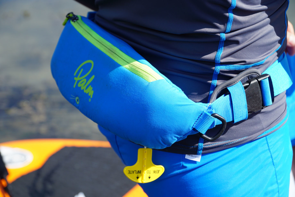 Should I wear a PFD when paddleboarding? / SUPboarder's Palm PFD guide ...